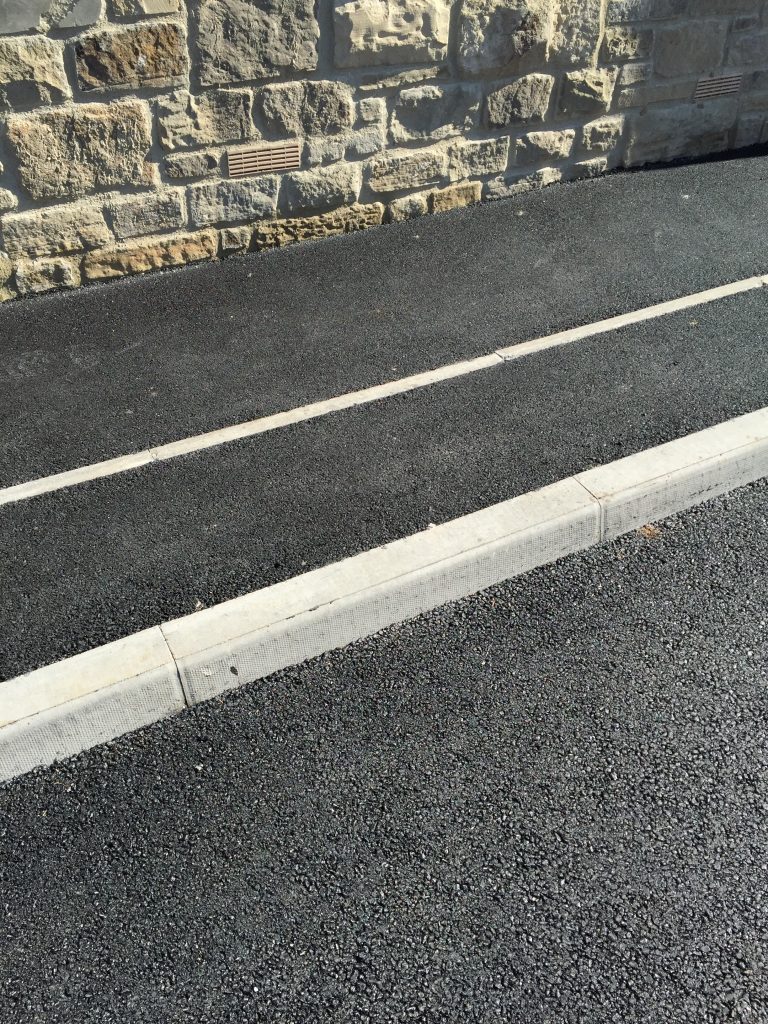 A Kerb Kerbstones and haunching - Blackoak Contracts | Surfacing